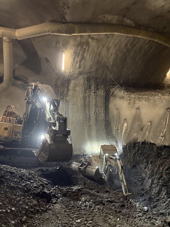 Excavators Working Underground To Dig a Tunnel Stock Image - Image of ...