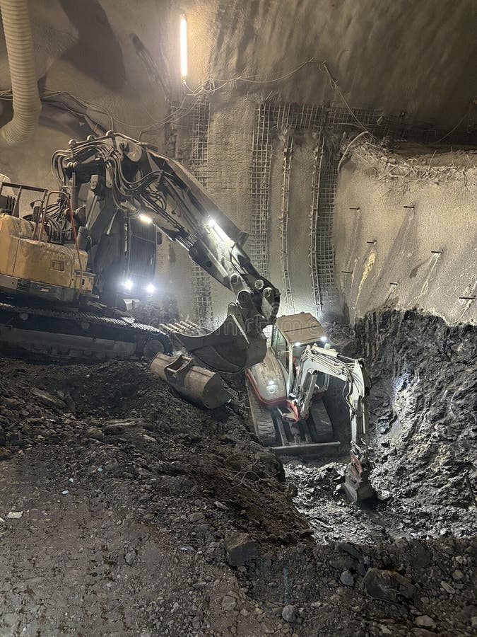 Excavators Working Underground To Dig a Tunnel Stock Image - Image of ...