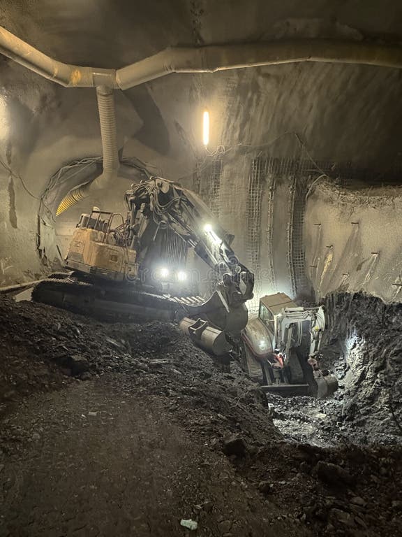 Excavators Working Underground To Dig a Tunnel Stock Image - Image of ...