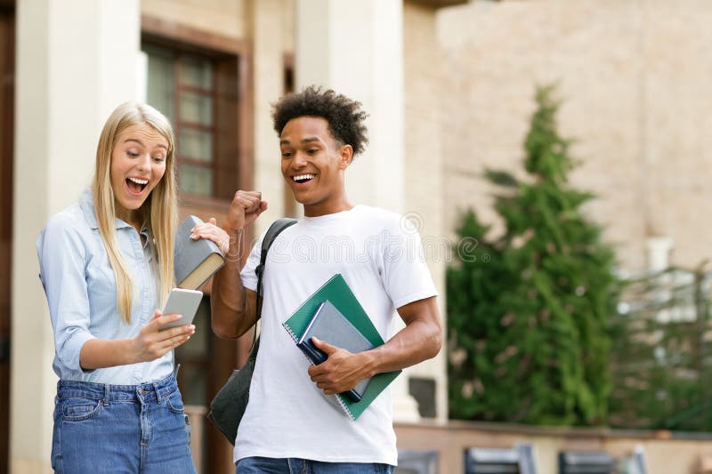 Excellent Marks. Surprised Students Checking Exam Results Stock Image ...