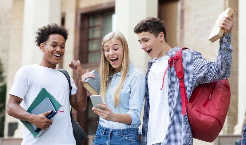 Excellent Marks Surprised Students Checking Exam Results Stock Photos ...