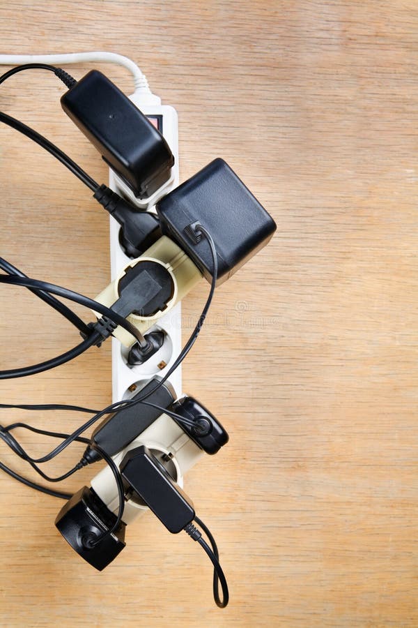 Excessive Extension on Power Outlet Stock Photo - Image of wooden ...