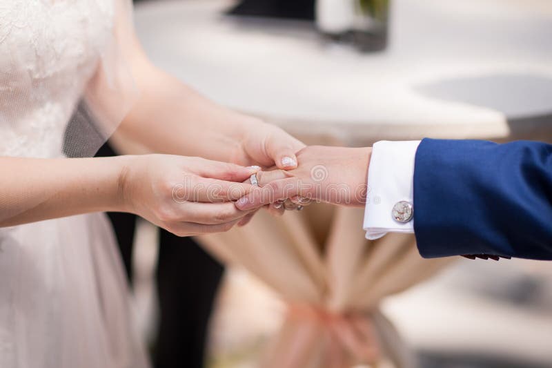 Exchange wedding rings stock image. Image of partner - 67361035