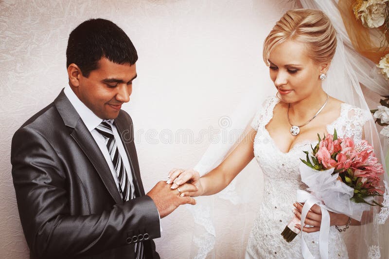 Exchange of wedding rings stock image. Image of marriage - 35262929