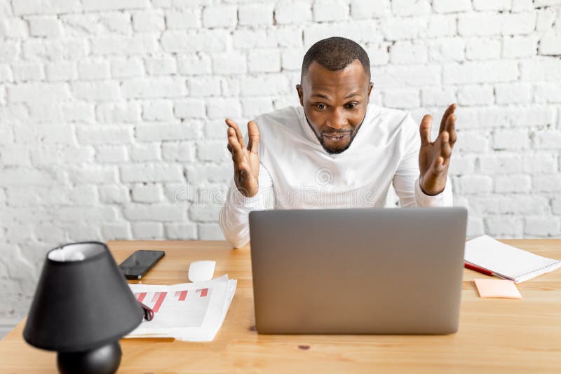 Excited African American Business Man Is Looking At The Laptop Screen