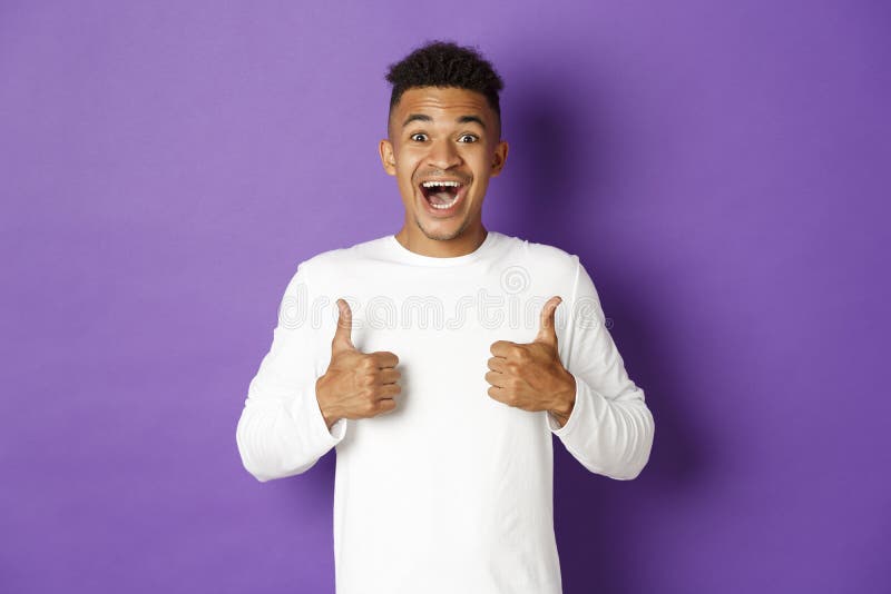 Excited African American Man Showing Thumbs Up Smiling Amazed Like