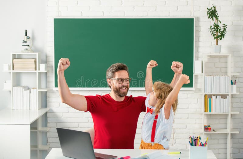 Excited Amazed Teacher and Schoolboy Learning in Class at School ...