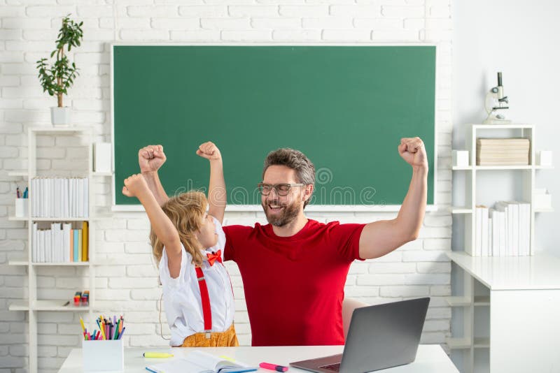 Excited Amazed Teacher and Schoolboy Learning in Class at School ...