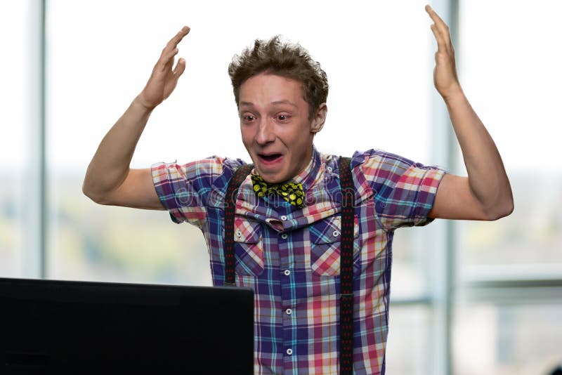 Excited Boy is Looking at the Computer. Stock Photo - Image of ...