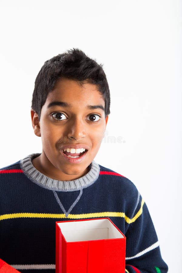 Excited boy opens gift stock image. Image of christmas - 74117041