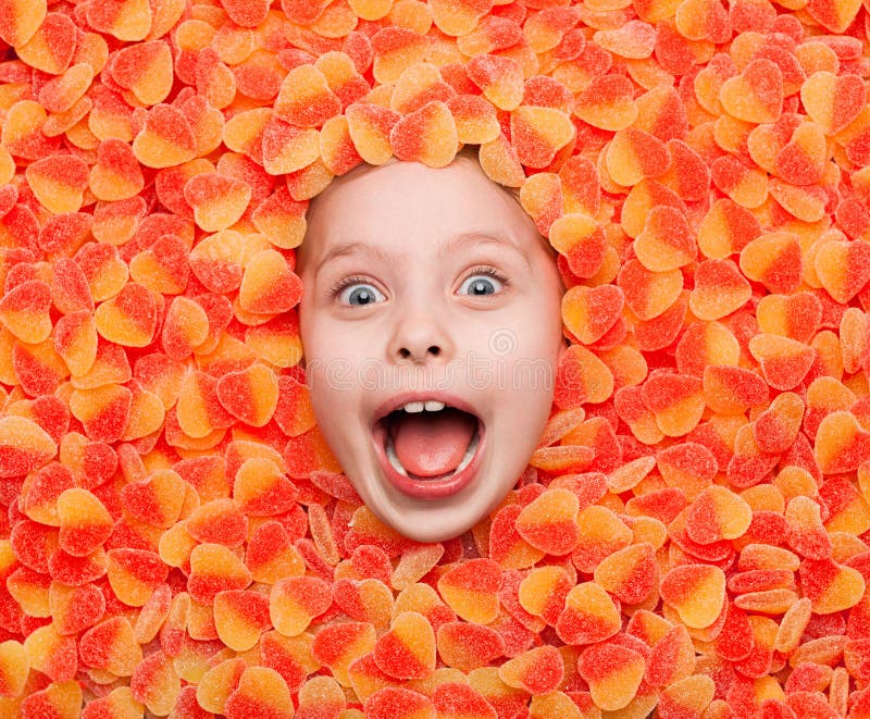 Excited boy in sweets stock photo. Image of grimace, conceptual - 94825936