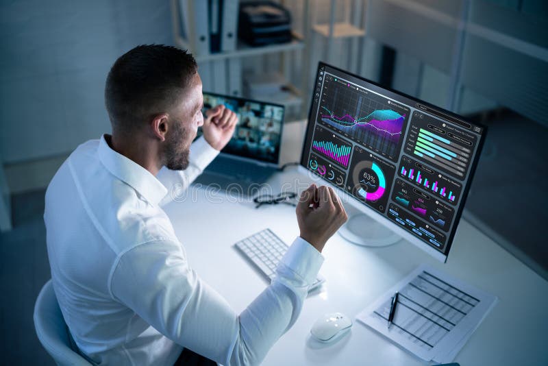 Excited Business Analyst Using Data Dashboard on Computer Stock Photo ...