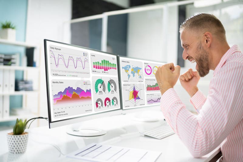 Excited Business Analyst Using Data Dashboard on Computer Stock Image ...