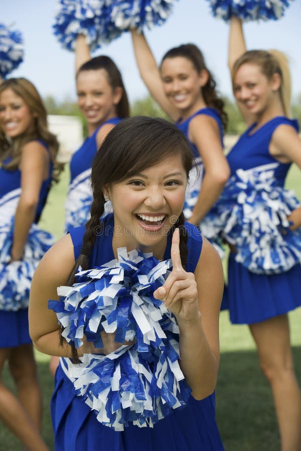 Excited Cheerleaders Cheering Stock Photo - Image of energetic, smile ...