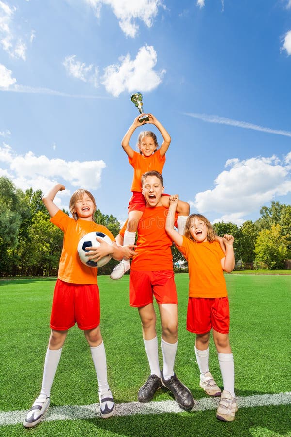 Excited Children with Won Cup Stand in Pyramid Stock Photo - Image of ...