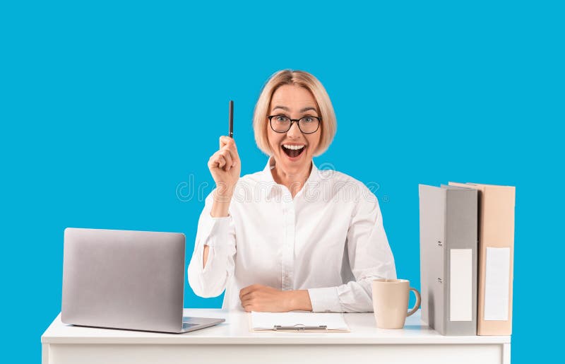 Excited Corporate Employee Having Creative Idea at Workplace with ...