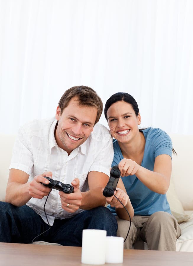 Excited Couple Playing Video Games Together Stock Image - Image of ...