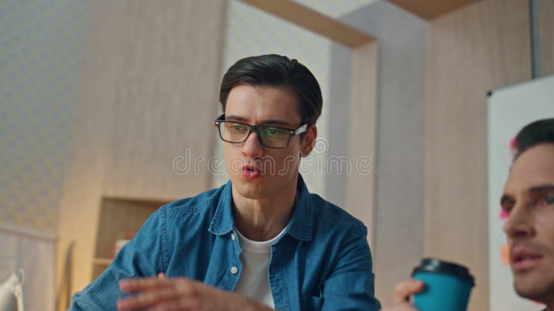 Excited Creators Discussing Computer Project Office. Eyeglasses Man ...