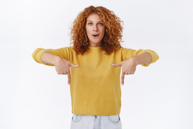 Excited Curious Redhead Female With Curly Hair Wear Yellow Sweater