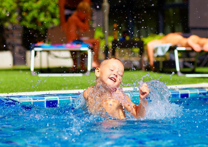 Excited Cute Boy Having Fun in Pool Stock Photo - Image of life, joyful ...