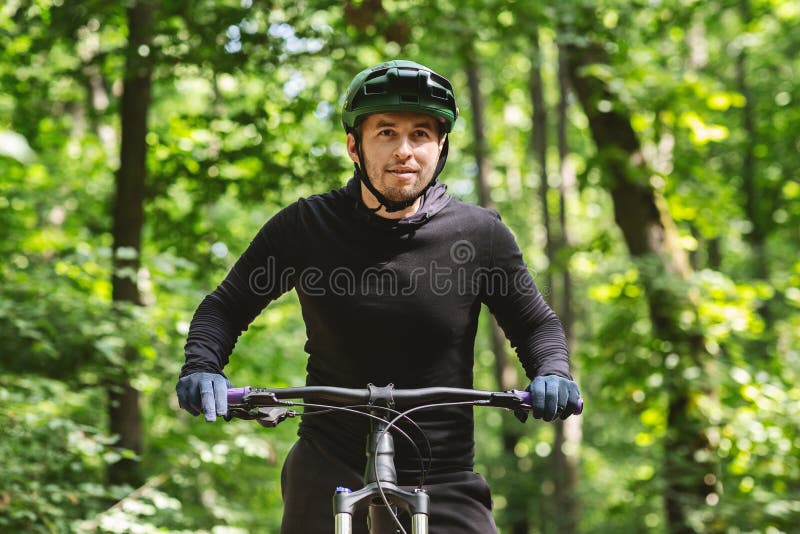 Excited Cyclist Looking Forward Over Forest Background Stock Image ...