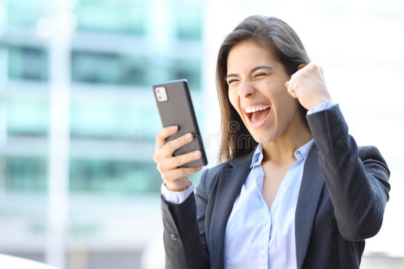 Excited Executive Celebrating Checking Cell Phone Stock Image - Image ...