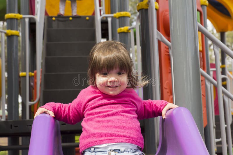 Excited Face of Child on Top of Slide Stock Photo - Image of baby, cute ...