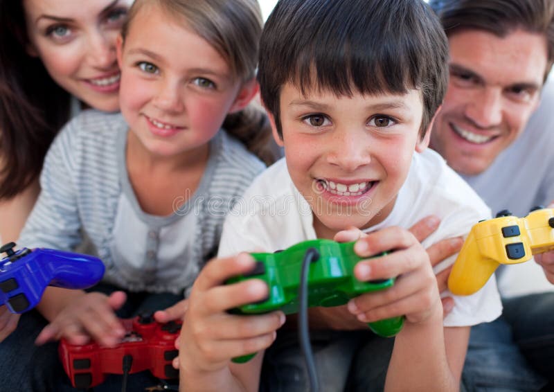 Excited Family Playing Video Games Stock Photo - Image of gamepad ...