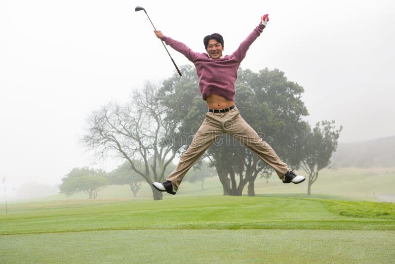Excited Golfer Jumping Up and Smiling at Camera Stock Image - Image of ...