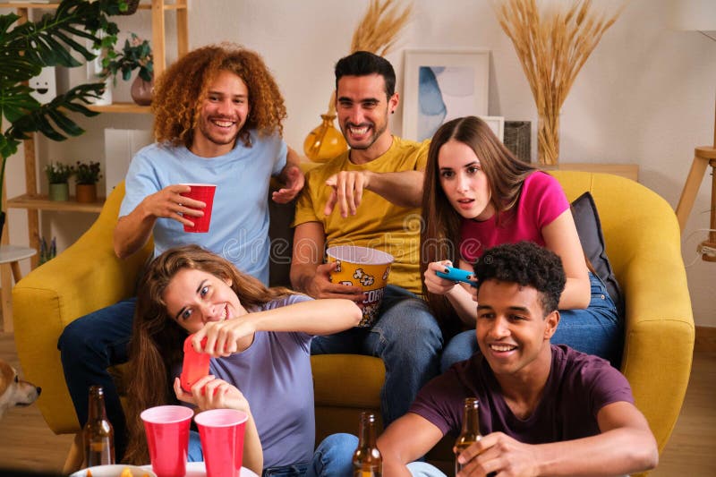 Excited Group of Friends Playing Video Games at Shared Flat. Stock ...