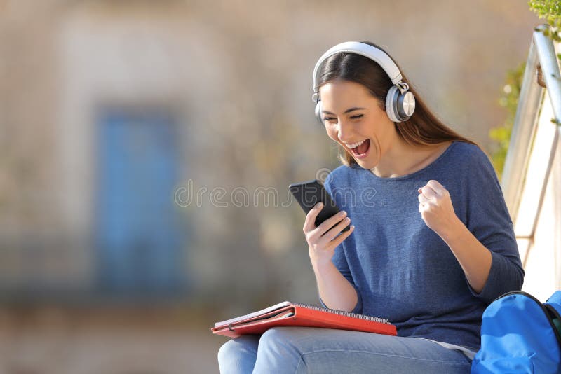 Excited Happy Student Checking Smart Phone in a Campus Stock Image ...