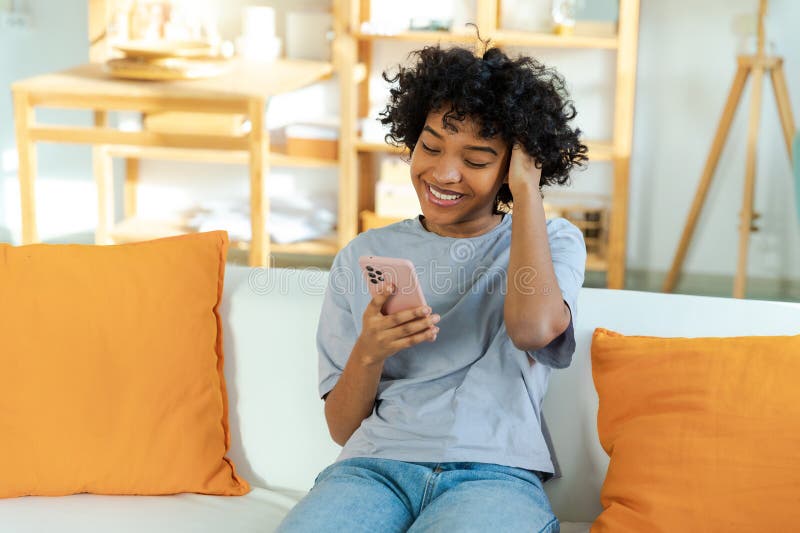 Excited Happy Young Black African American Woman Holding Cell Phone