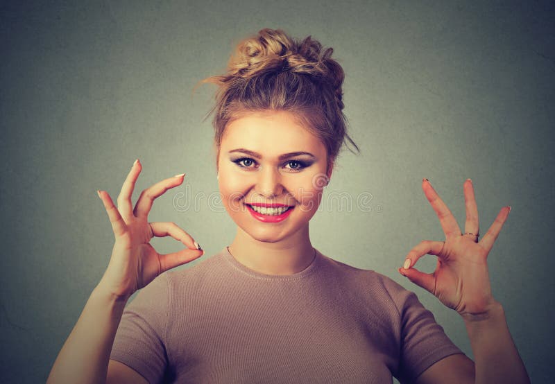 Excited Happy Young Optimistic Woman Giving Ok Sign Gesture With Two