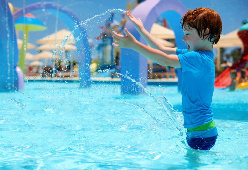 Summer Activity on the Beach. Family Having Fun Digging the Kid in a ...