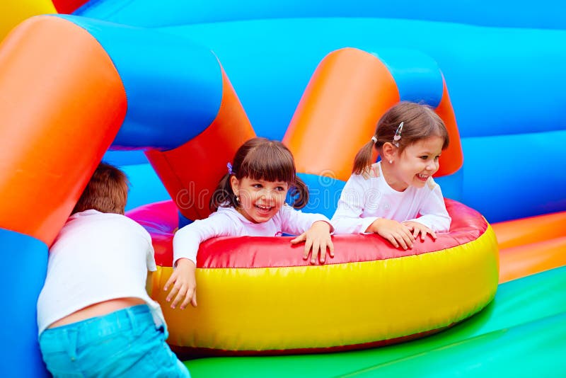 Excited Kids Having Fun on Inflatable Attraction Playground Stock Image ...