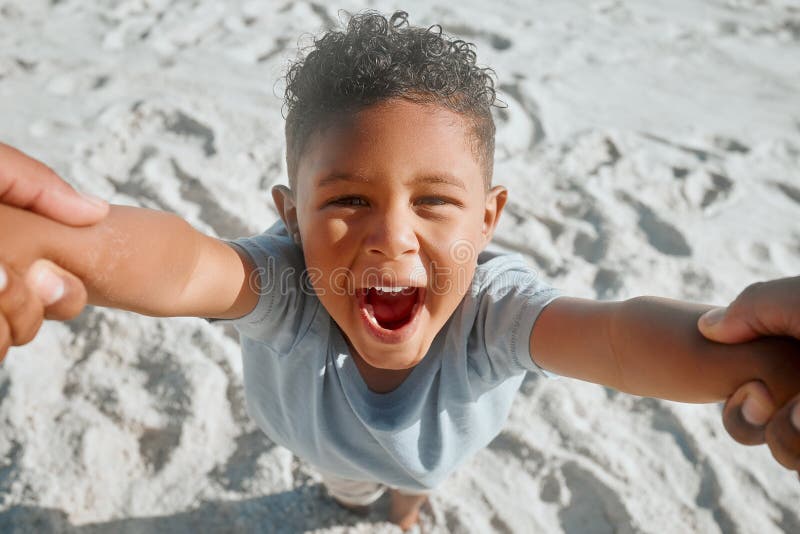 Excited Little Mixed Race Boy Having Fun while His Father Spins Him ... Excited Little Mixed Race Boy Having Fun while His Father Spins Him ...