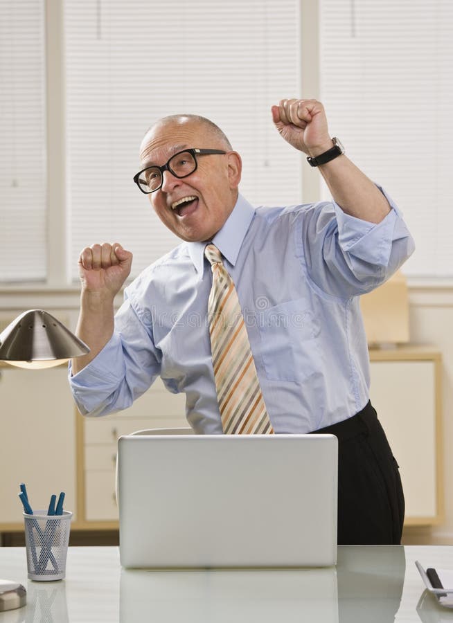 Excited Man on Laptop stock image. Image of clothing - 10092867