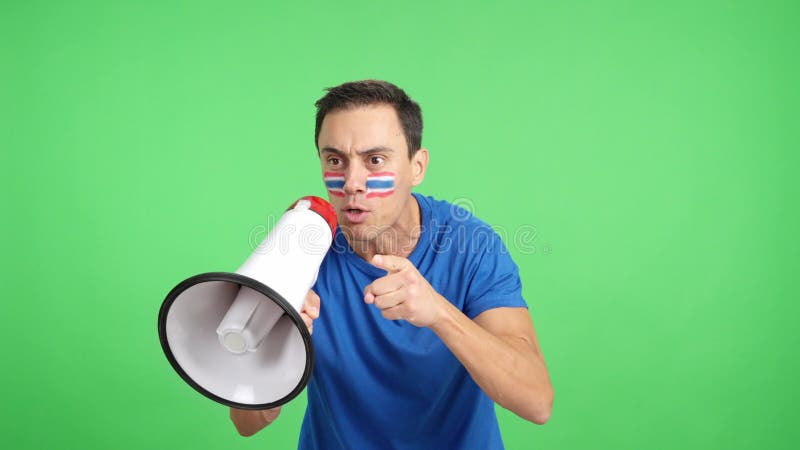 Excited Man with Thai Flag on Face Using a Megaphone Stock Footage ...