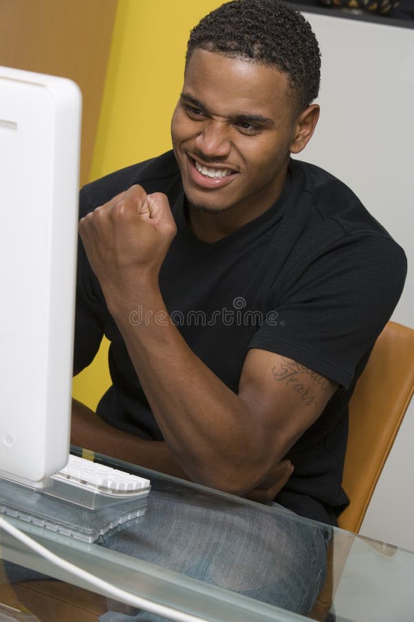 Excited Man Working on Computer Stock Photo - Image of lifestyle ...