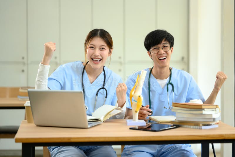 Two Cheerful College Students Celebrating Success Together. Friendship ...