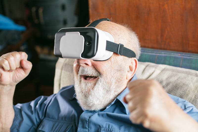 Happy Old Man Using Virtual Reality Goggles at Home Stock Image - Image ...