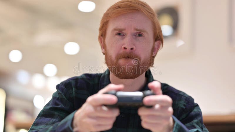 Excited Redhead Man Playing Video Game Stock Photo - Image of male ...
