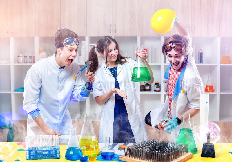 Excited scientists in lab stock photo. Image of equipment - 121469612
