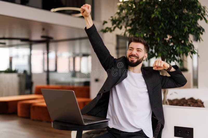 Excited Screaming Man Looking at the Screen of His Computer and ...