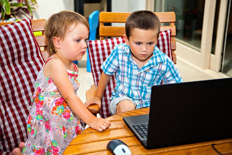 Excited Siblings with Laptop Computer Stock Image - Image of concept ...