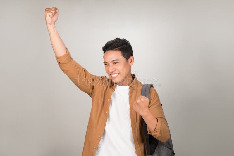 An Excited Student with His Hands Up when he Passed the Exam Stock ...