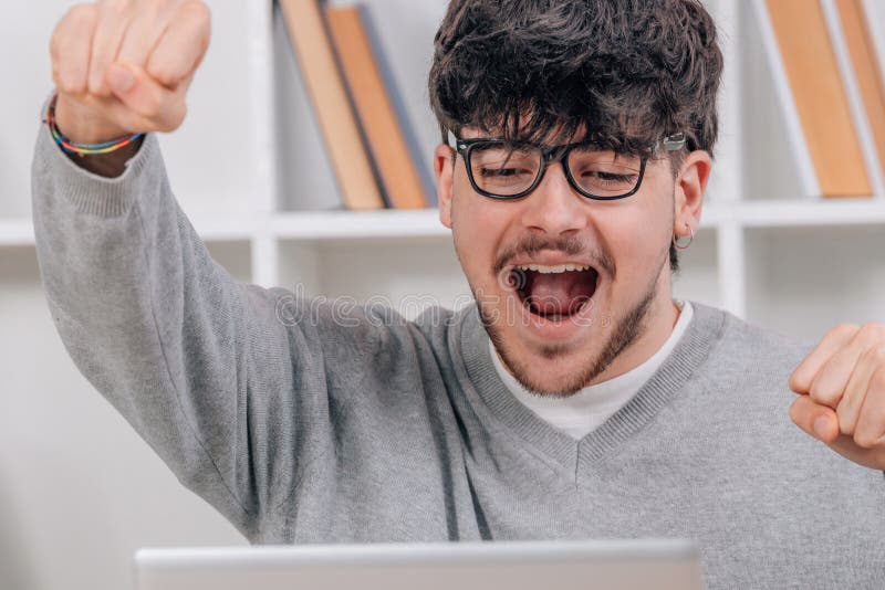 Excited Student at Computer Celebrating Stock Photo - Image of ...