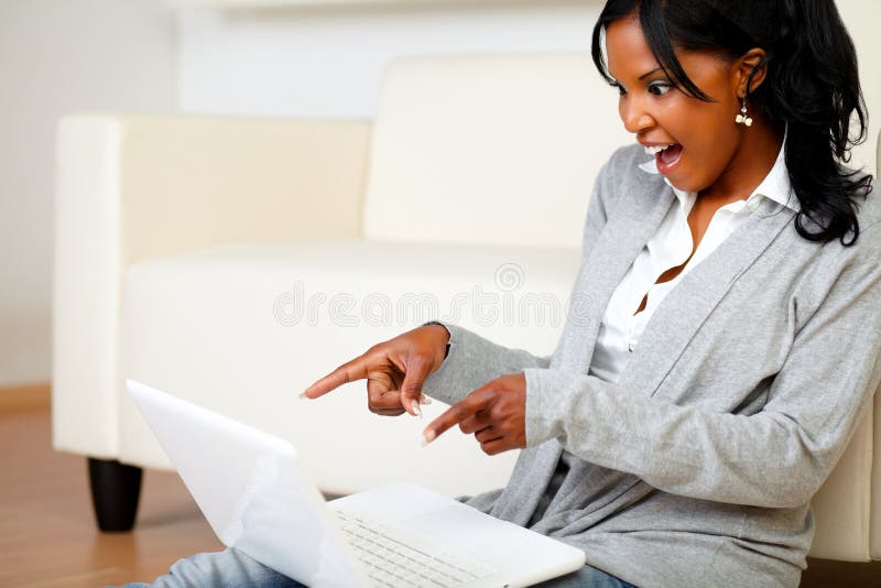 Excited Stylish Woman Pointing the Laptop Screen Stock Photo - Image of ...