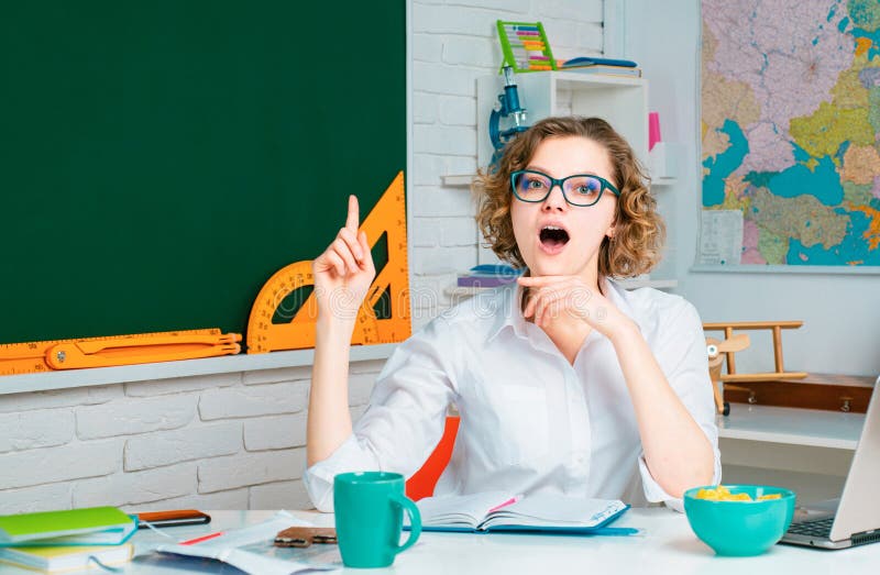 Excited Teacher Have Idea at Classroom in School. Stock Photo - Image ...