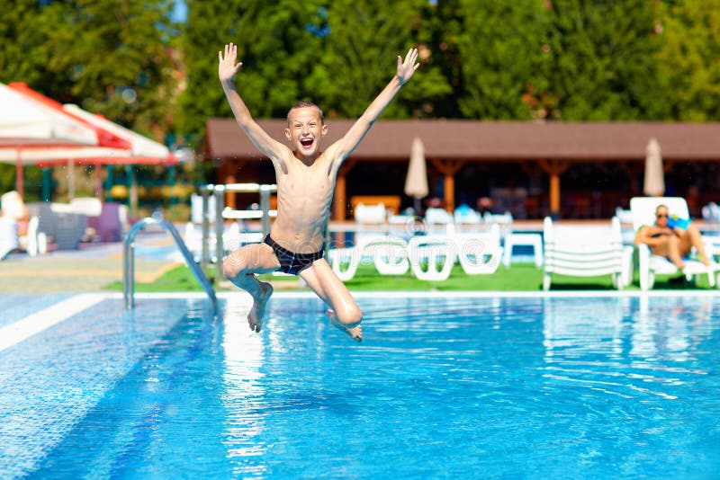 Excited Teenage Boy Jumping in the Pool Stock Photo - Image of heat ...
